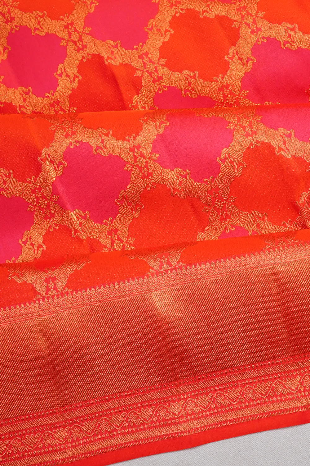 Taranga Kanchi Silk Jaal Pink And Red Saree