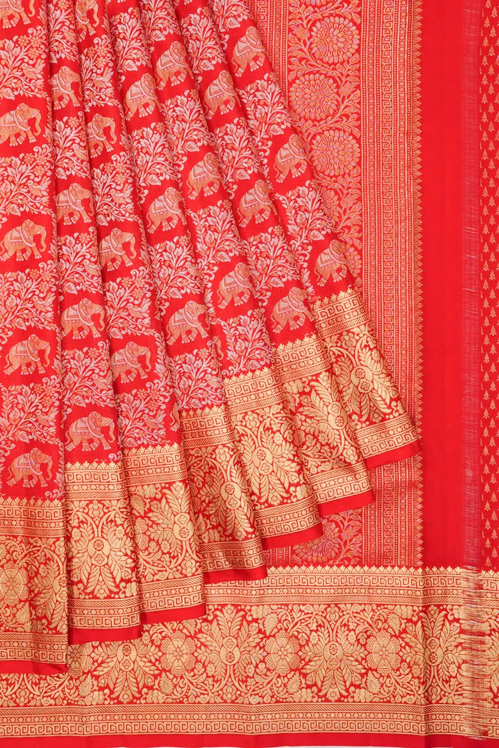 Taranga Kanchi Silk Jaal And Butta Red Saree
