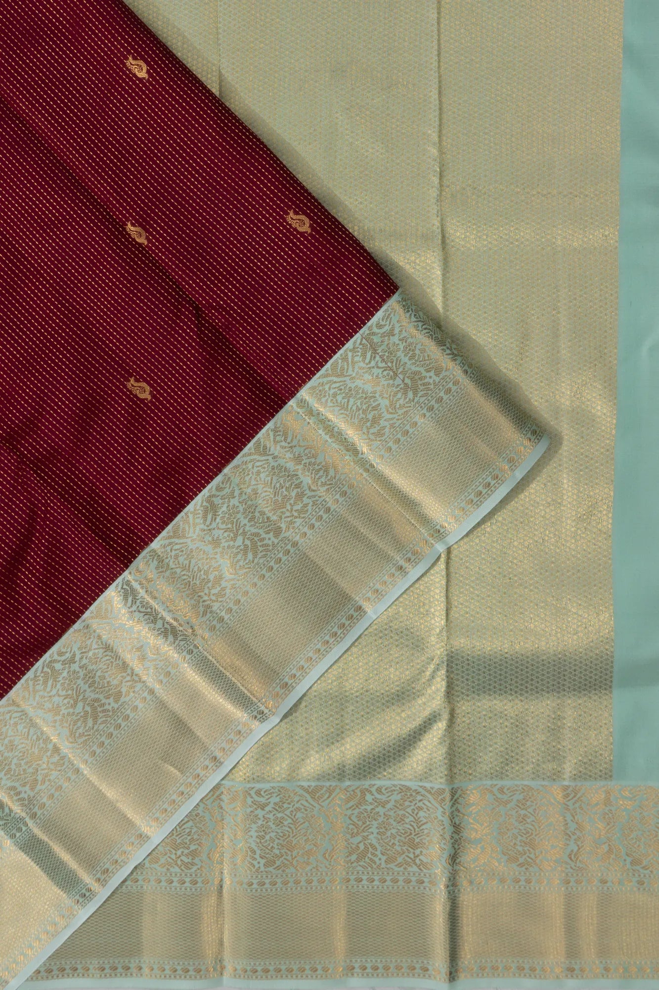 Taranga Kanchi Silk Lines And Butta Maroon Saree
